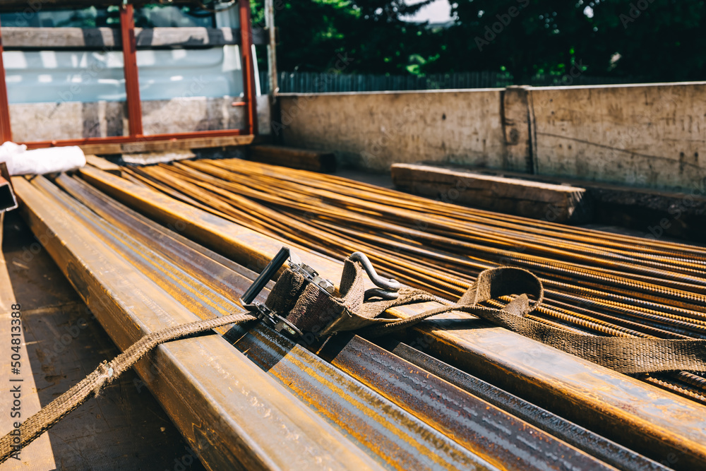 Steel profile tubes, corners and rods for the concrete reinforcing lies ...