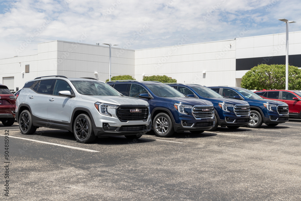 GMC Terrain SUV display at a dealership. GMC offers the Terrain in SLE ...
