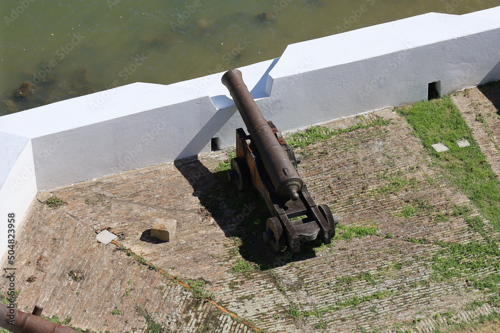 Cannon medieval, cannon for firing cannonballs, cast iron, on wooden ...
