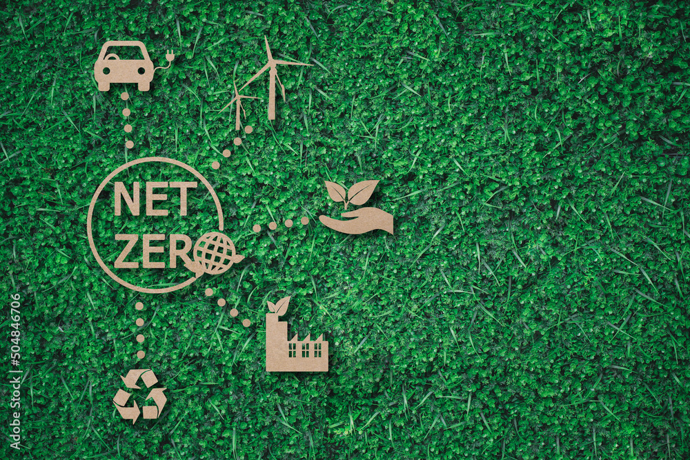 net zero text with earth between energy saving icon paper cut on green ...