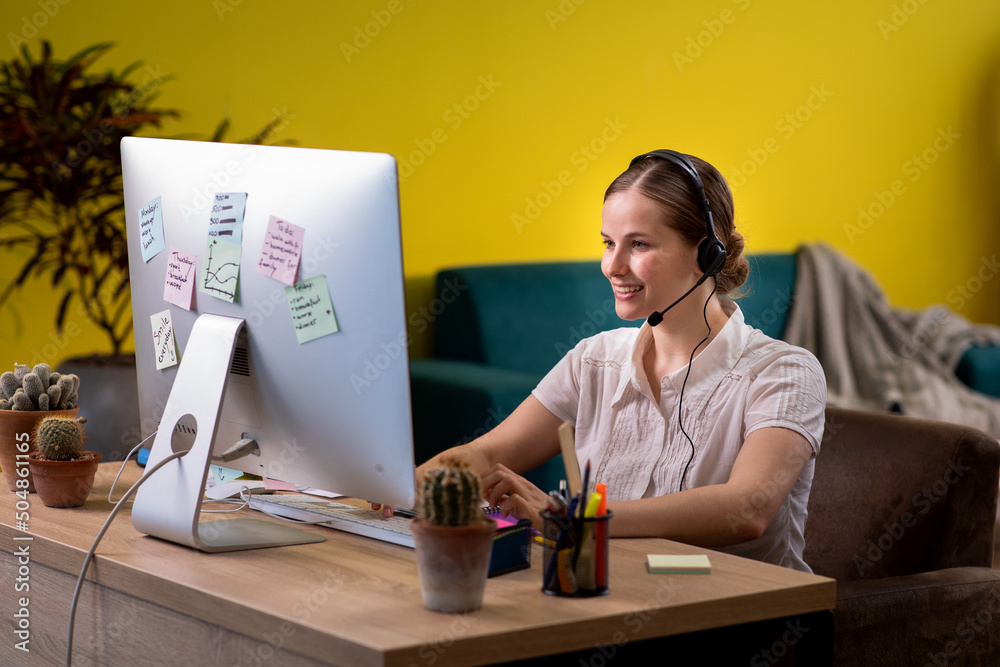 Working from home online beautiful lady architect analysing her notes ...