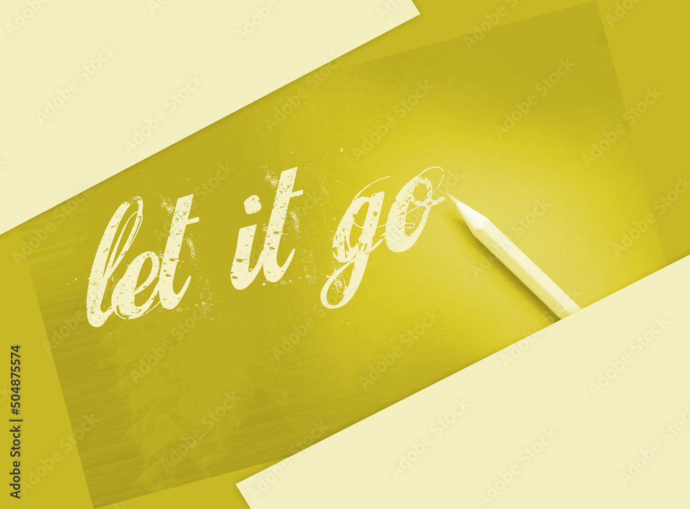 Let it go words written with a yellow pencil on black. Forgiveness ...