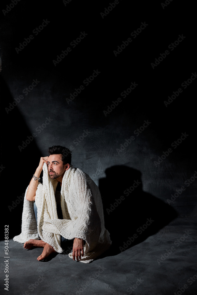 Handsome dark haired man feeling lonely and depressed. Actor playing ...