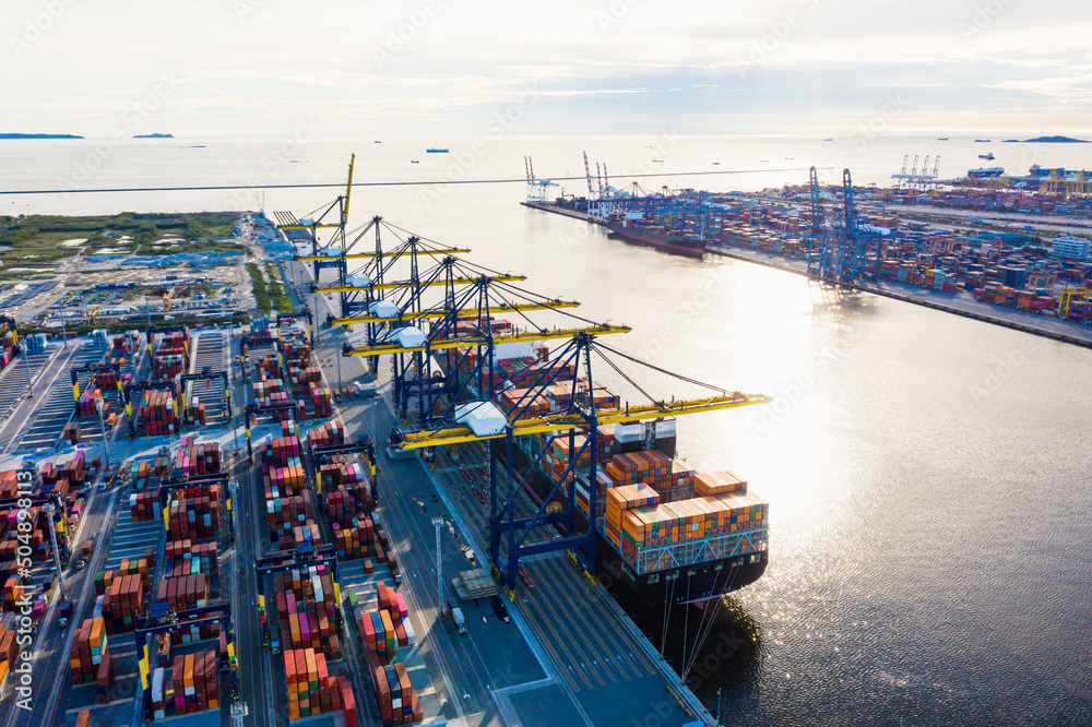Aerial top view of container ship loading and unloading in cargo ...