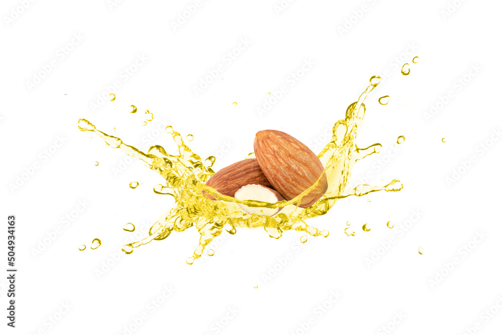 Almond oil splash and almonds nuts isolated on white background. Stock ...