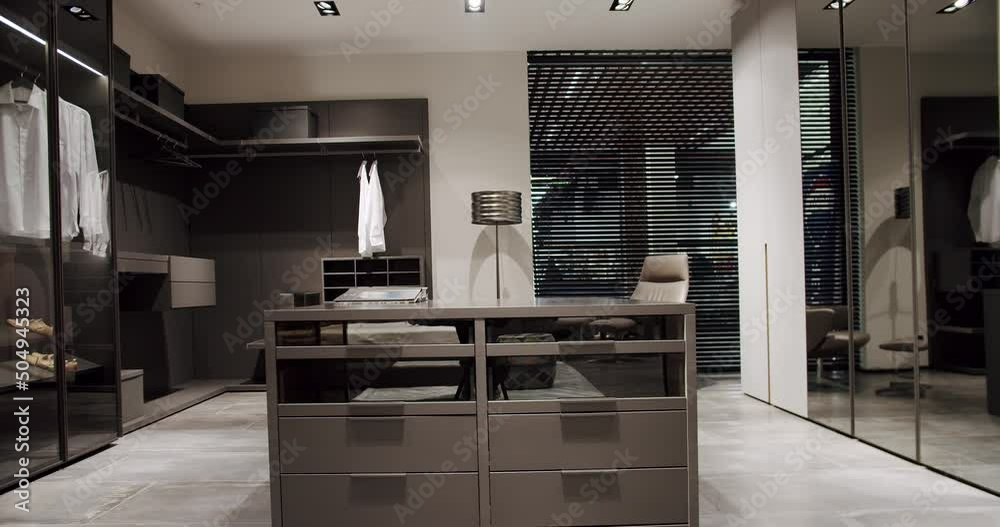 Stockvideon Dressing room with shirts. Elegant Wooden Built Walk In ...