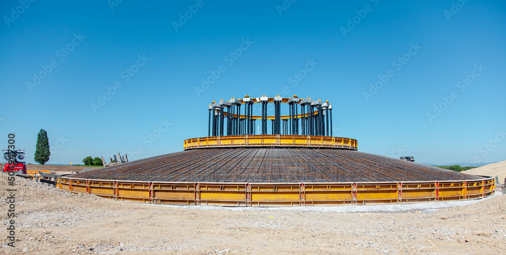 Construction site. concrete foundation of wind turbines with concrete ...