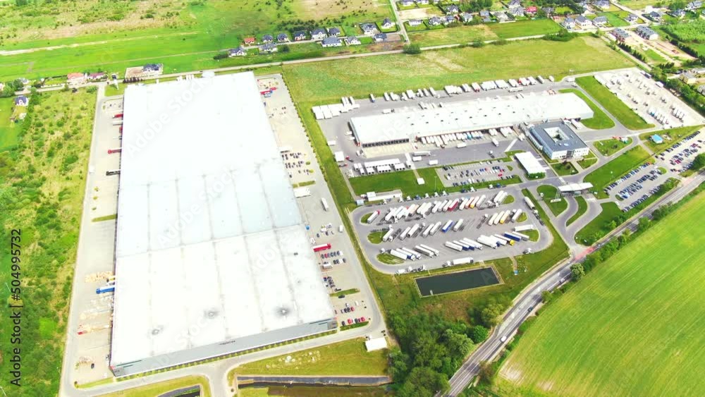 Aerial top down view of the big logistics park with warehouses, loading ...