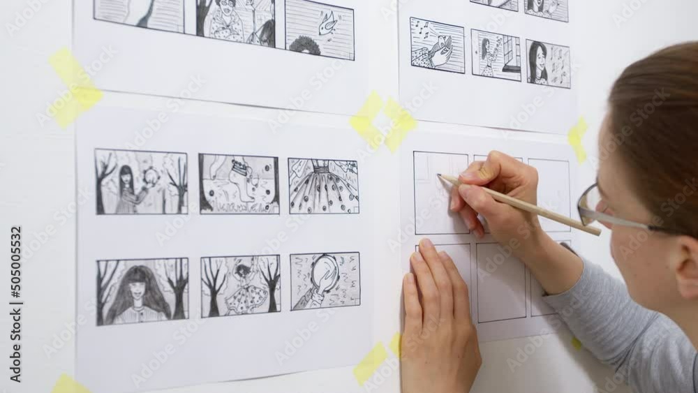 An artist draws cartoon characters storyboard frames. Sketches of ...