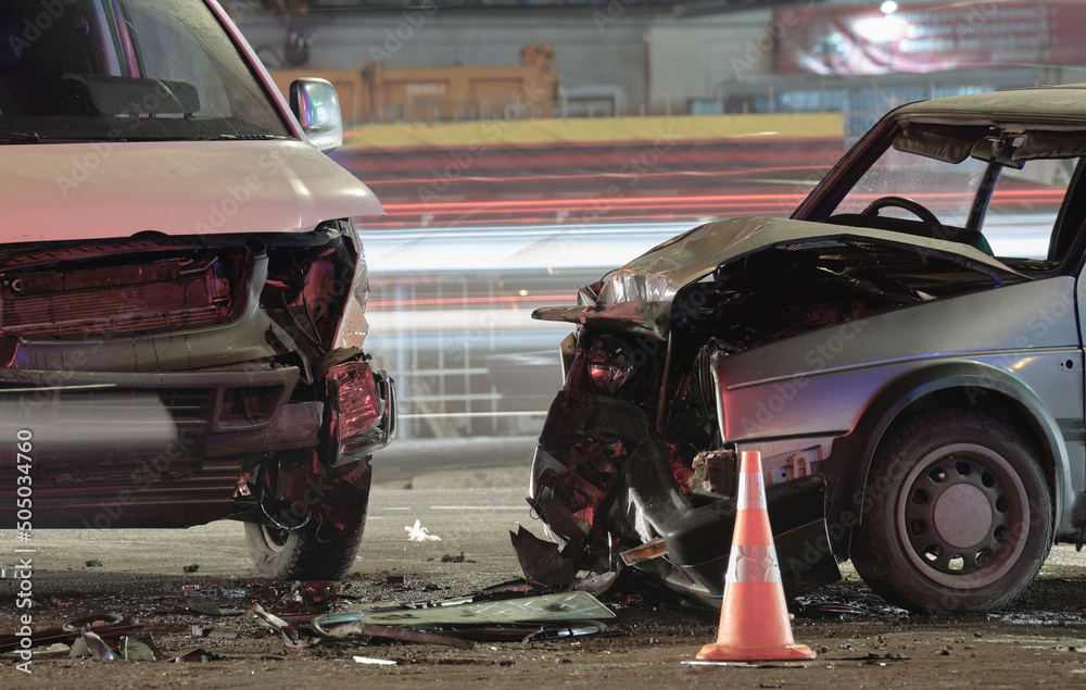 Damaged in heavy car accident vehicles after collision on city street ...