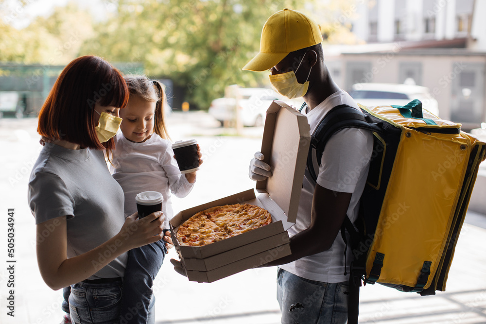Food shipping and people concept - happy delivery african man in face ...