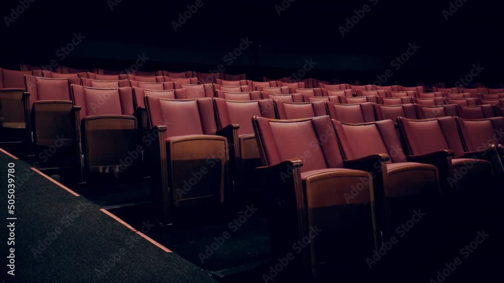 rows of seats in a cinema theatre auditorium vídeo do Stock | Adobe Stock