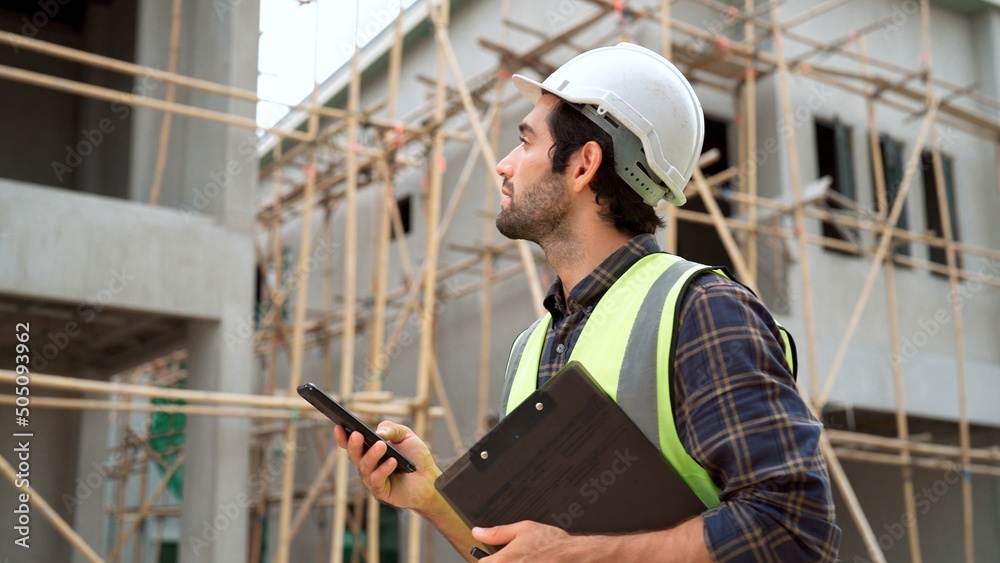 Portrait of smart male civil engineer worker with safety uniform and ...