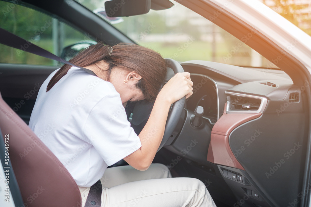 woman feeling stress and angry during drive car long time. Asian girl ...