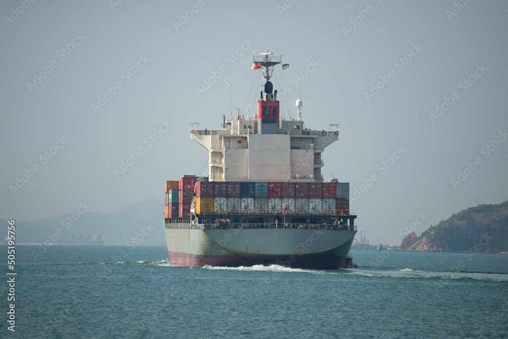 Foto de container ship commercial vessel alongside in port for loading ...