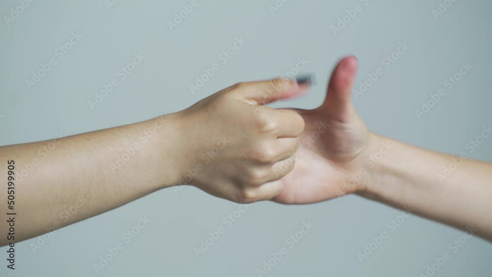 Thumb wrestle between two people. Human arm and thumb wrestling. Woman ...