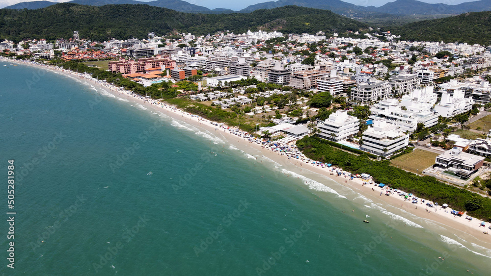 Aerial drone image of beach with building and urbanism in front of the ... Aerial drone image of beach with building and urbanism in front of the ...