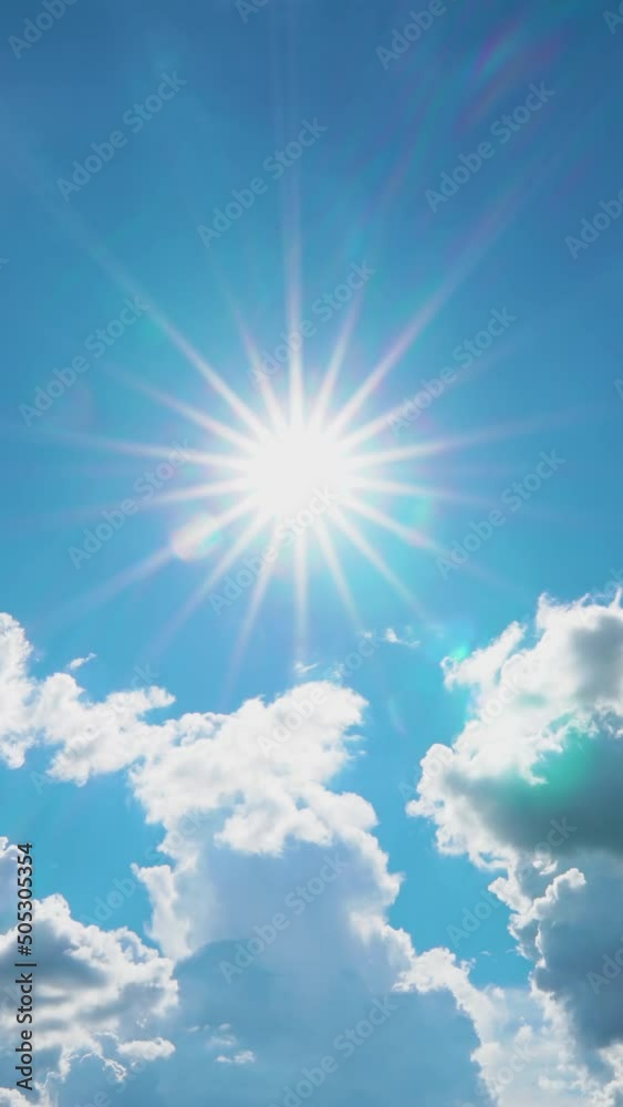 Vertical Time lapse sun and clouds moving on blue sky with sun shines ...