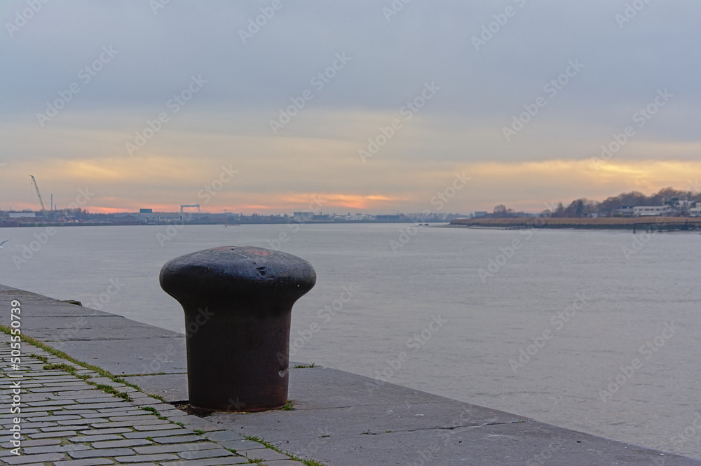 Poster Mooring bollard on a quay along river Scheldt in Antwerp ...