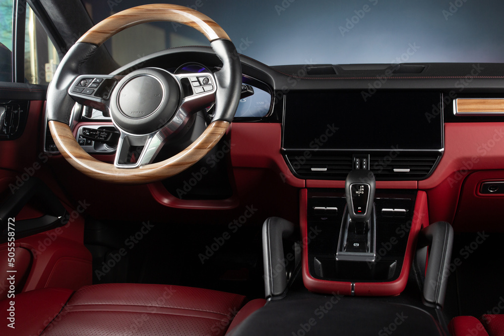 Modern car interior. White leather seats and dashboard inside modern ...