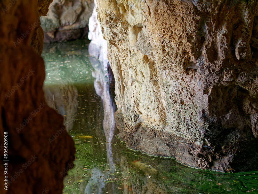 Underground lake inside the natural volcanic caves Stock Photo | Adobe ...