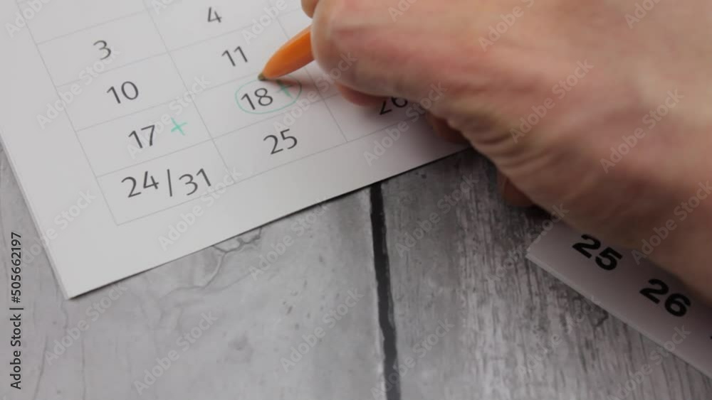 The concept of marking the date on the calendar. Marks the date with a ...