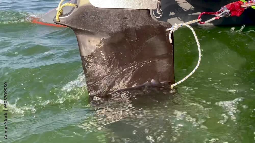 Rudder blade close up. Afterpiece of rudder. Part of catamaran control ...