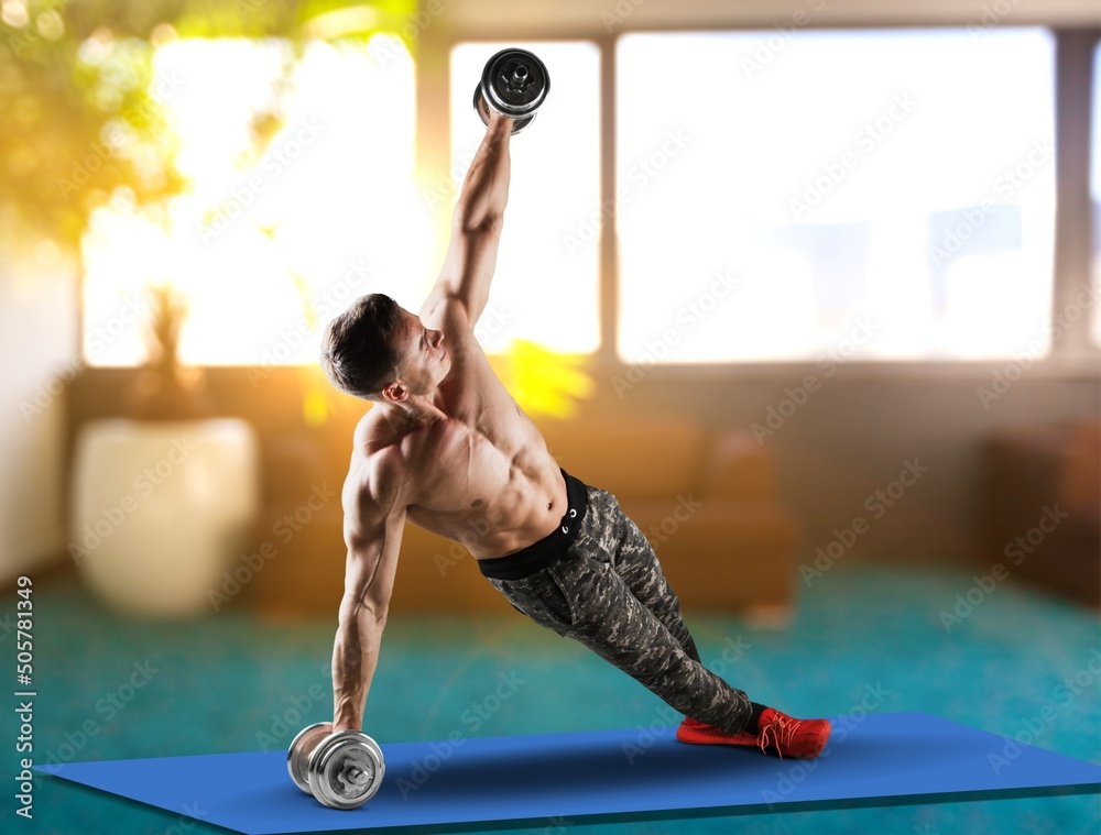 Performed by a fit guy lying on a mat. Intense reciprocal exercise at a ...