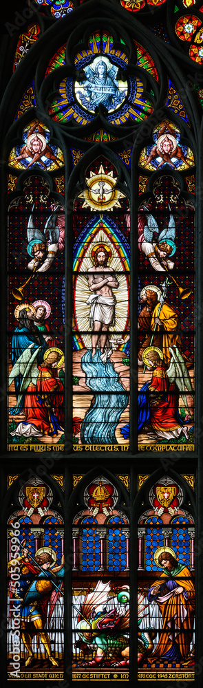 Stained-glass window depicting the baptism of Jesus Christ by John the ...
