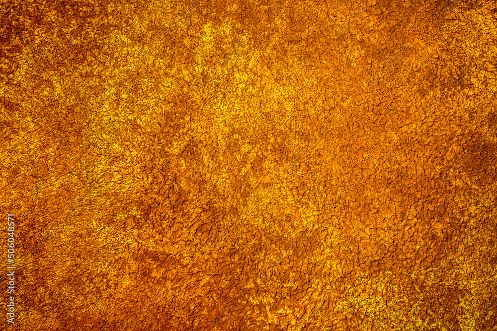 Golden wall with abstract spots as a background. Beautiful golden ...