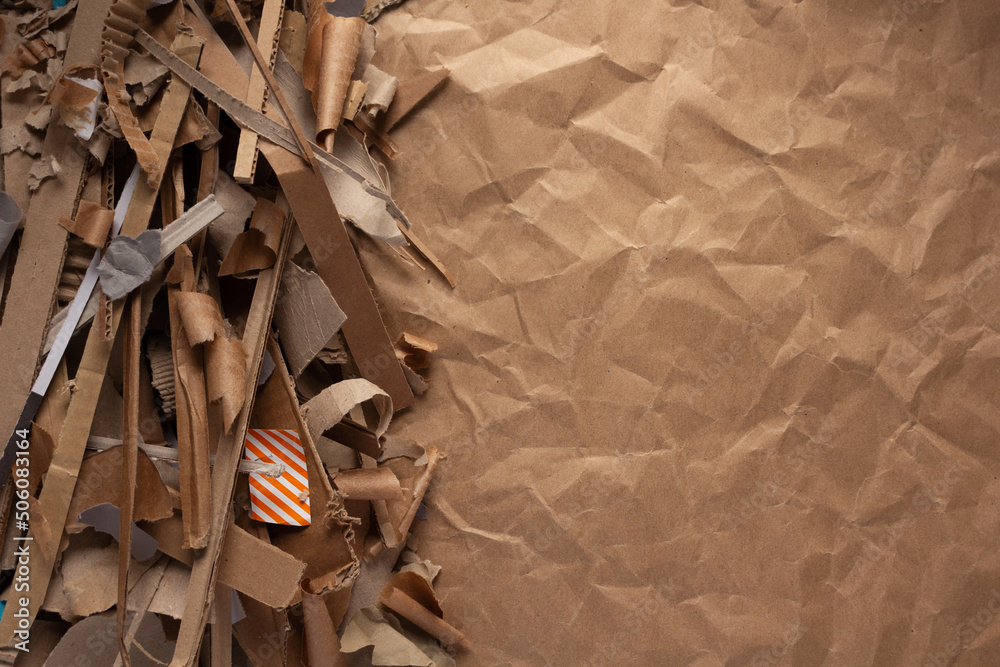 Waste paper as background texture. Recycling concept and brown ...