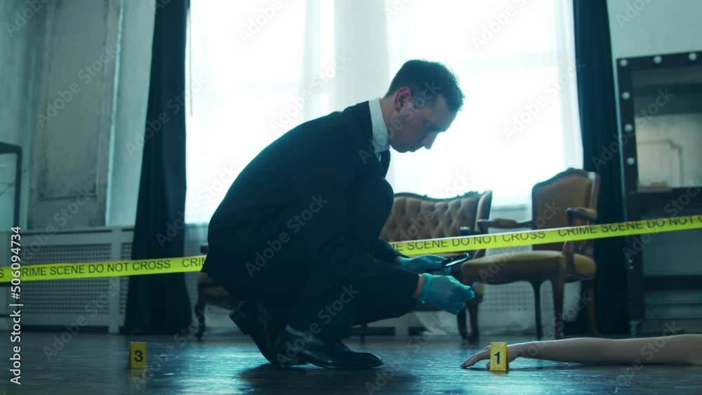 Detective Collecting Evidence in a Crime Scene. Forensic Specialists ...