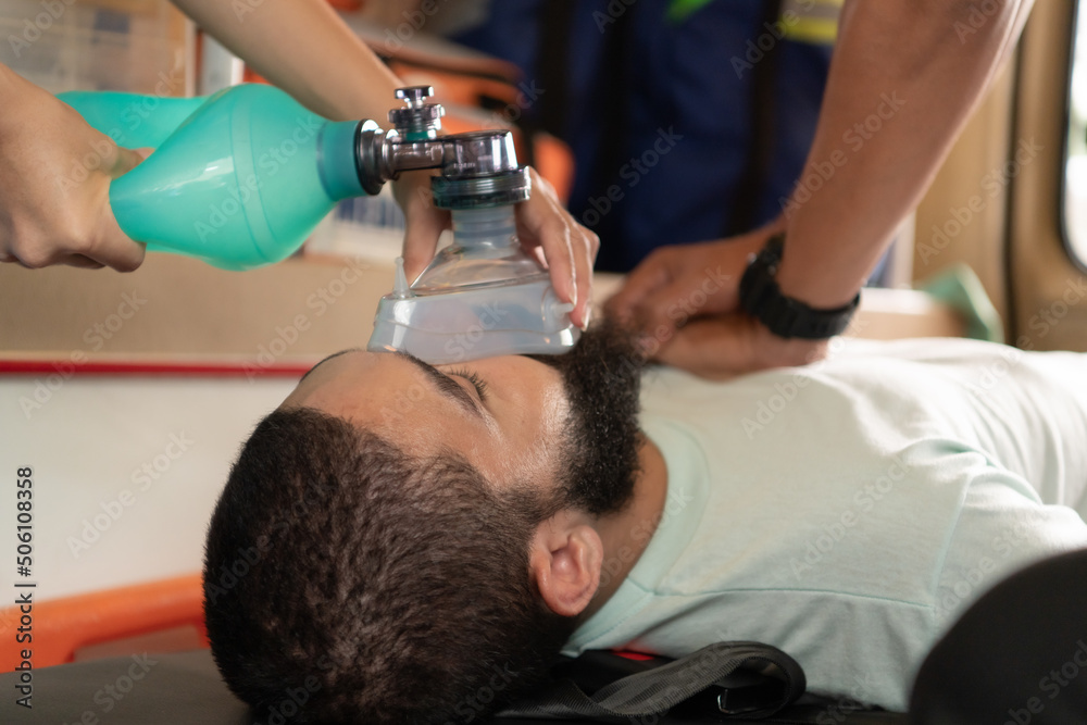 First aid assistance of the ambulance medical team Stock Photo | Adobe ...