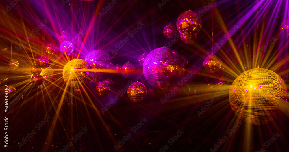 fireworks in the night mirror disco balls in the light of multi-colored ...