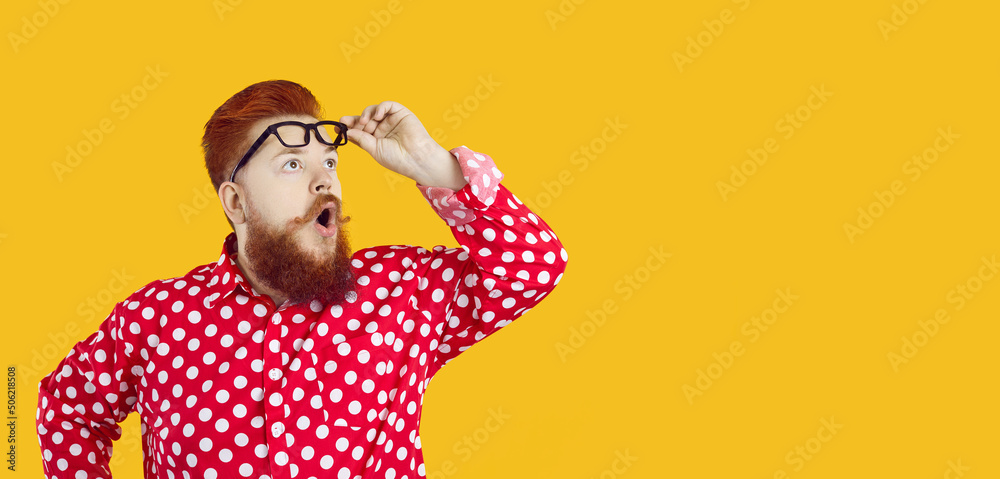 Funny charismatic chubby man with shocked expression looks at copy ...