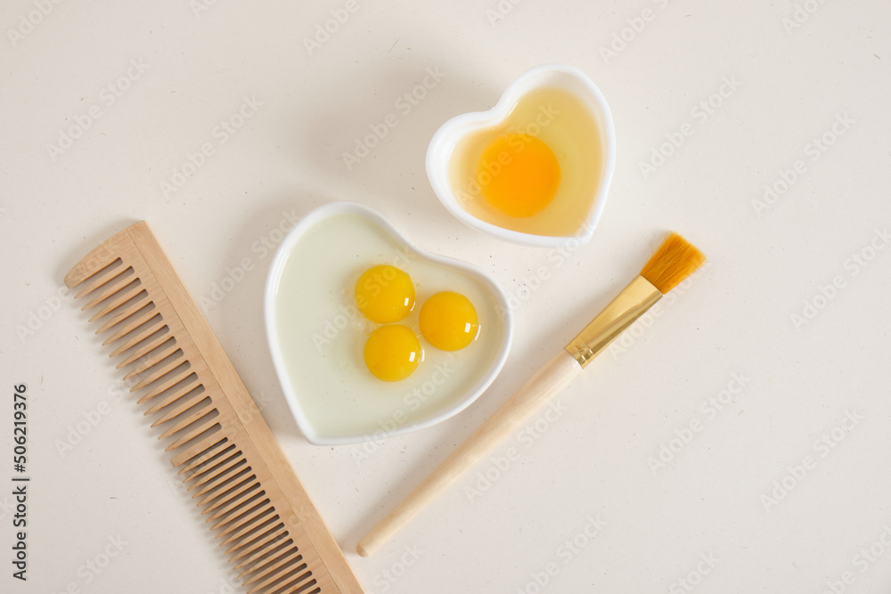 egg-based face, hair and body mask, DIY natural cosmetics concept,comb ...