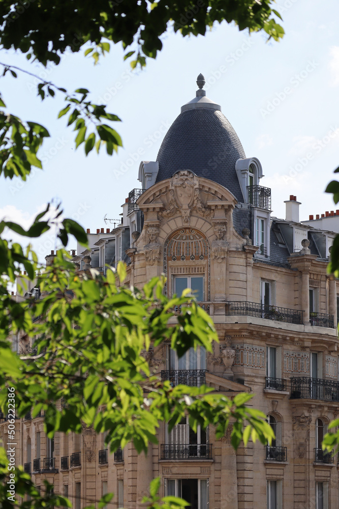 The famous Parisian attics (mansard roofs) on the top floors of 19th ...