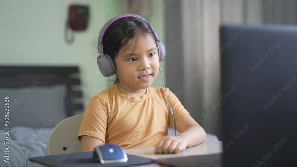 asian child learning on computer laptop or kid girl student back to ...
