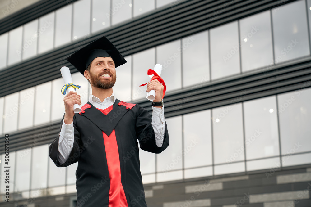 Front view of master graduating from college, university, high school ...