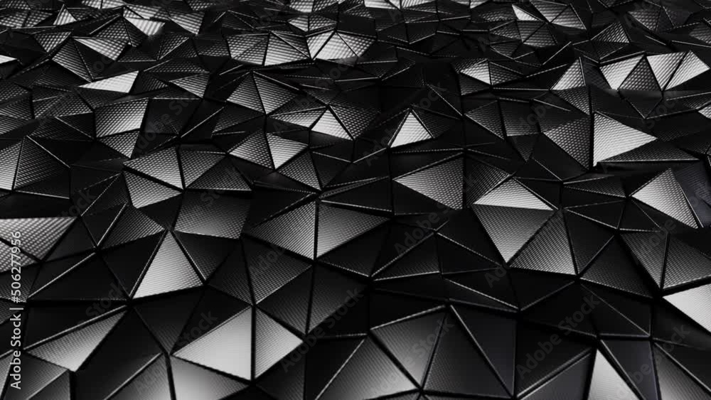 Realistic looping abstract 3D animation of the dark moving carbon fiber ...