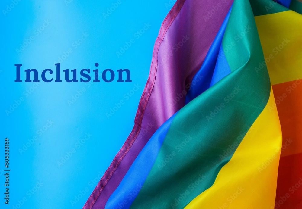 Rainbow flag with text INCLUSION message. Rainbow lgbtq flag made from ...
