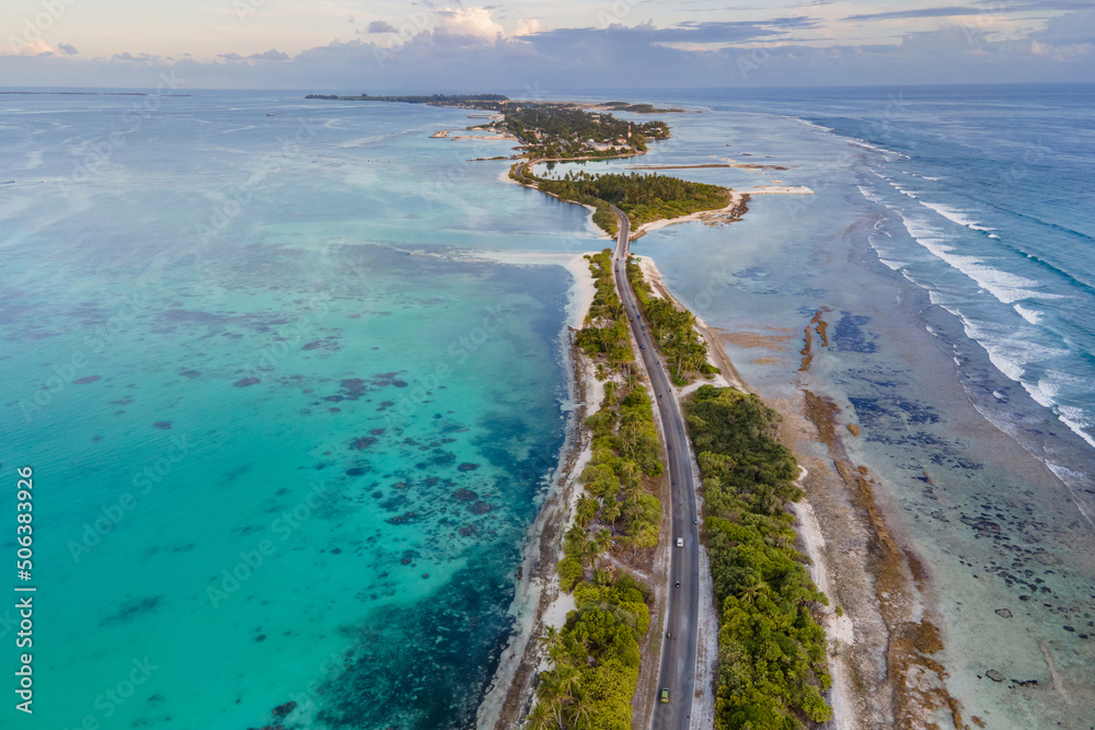 Aerial view of tropical beach landscape and local road at addu city ...