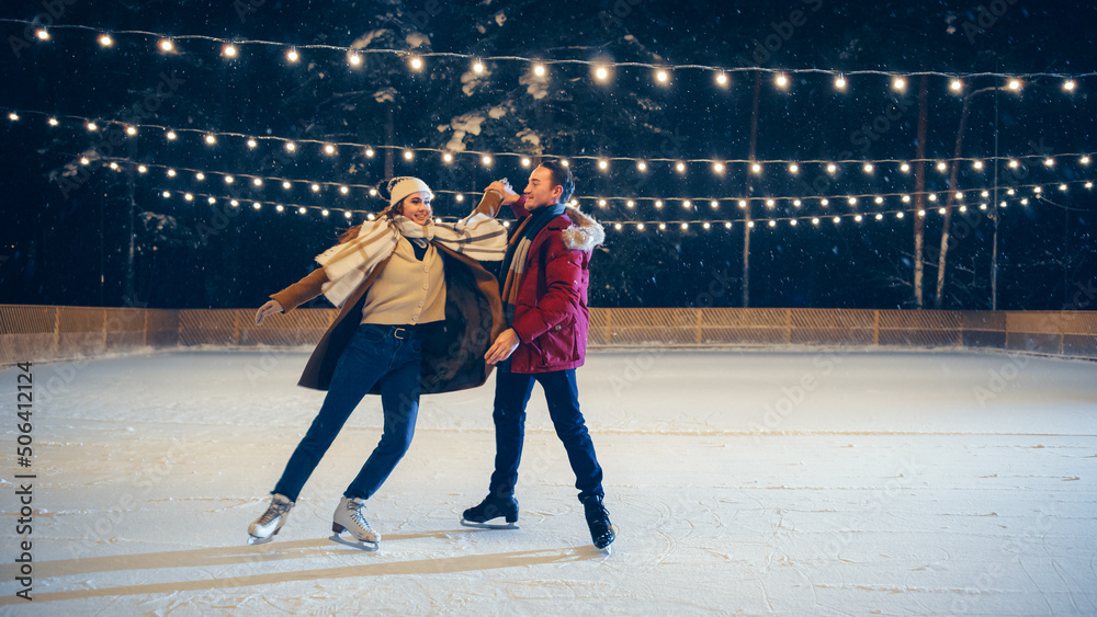 Romantic Winter Snowy Evening: Ice Skating Couple Having Fun, Step on ...