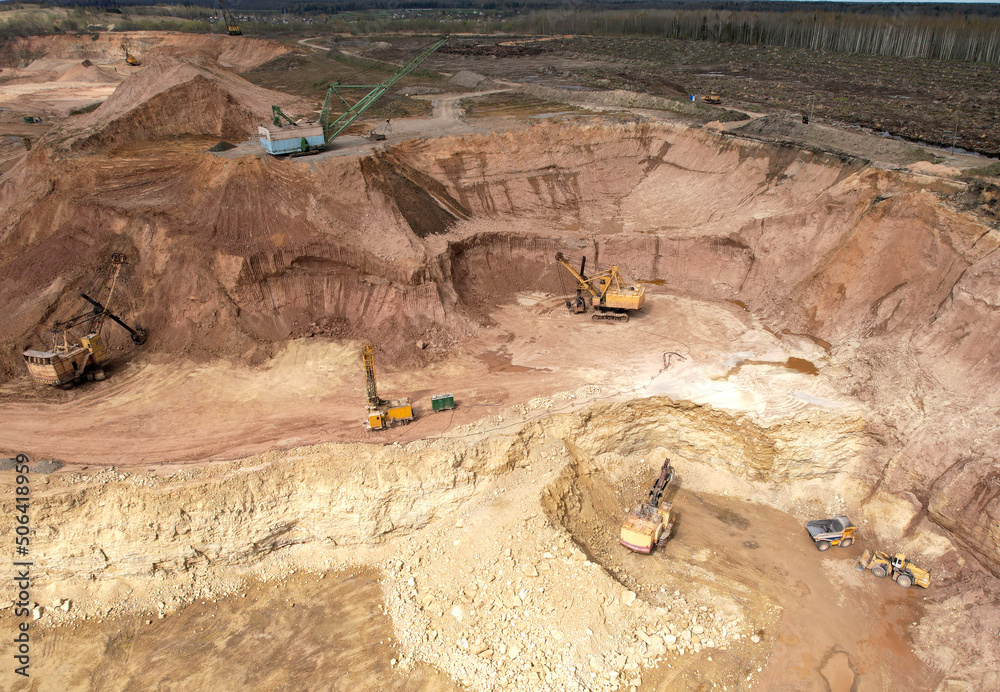 Walking dragline excavator in open pit mining. Mining clay in quarry ...