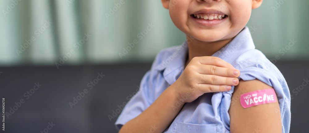 Portrait of happy smile vaccinated little asian kid boy children ages 5 ...