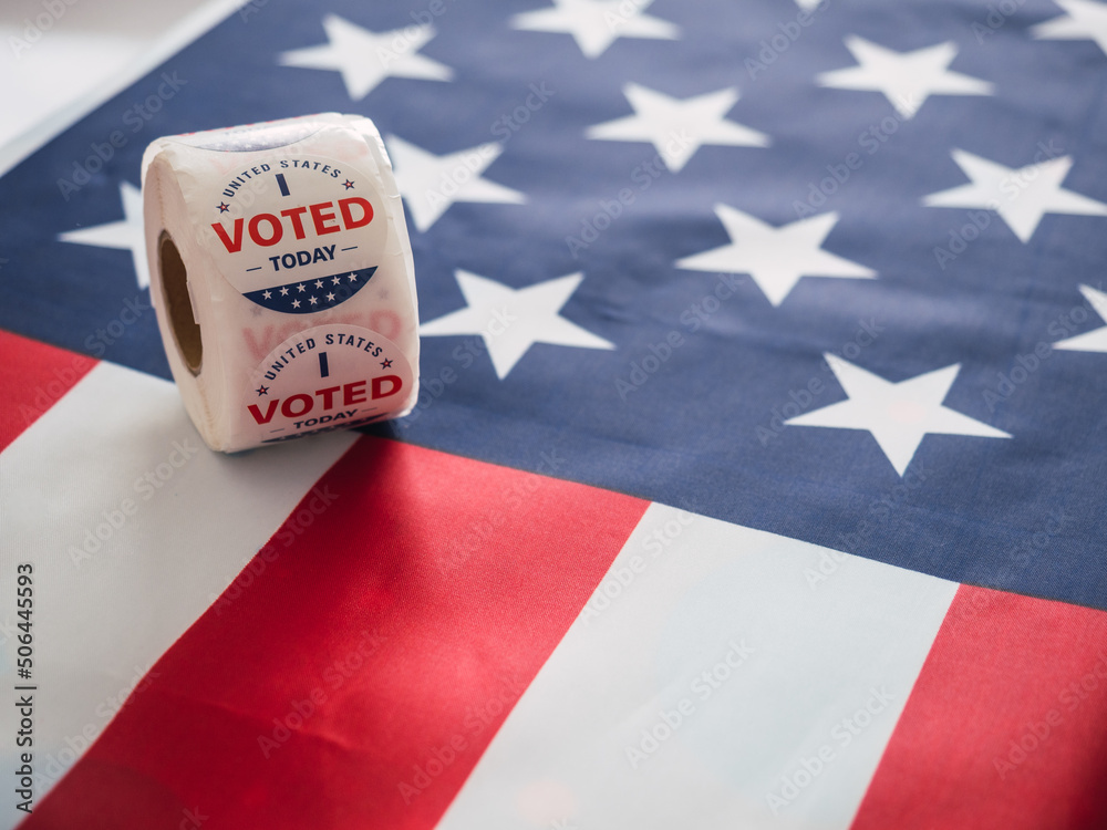 USA flag with "I Voted" sticker with copy space. elections concept ...
