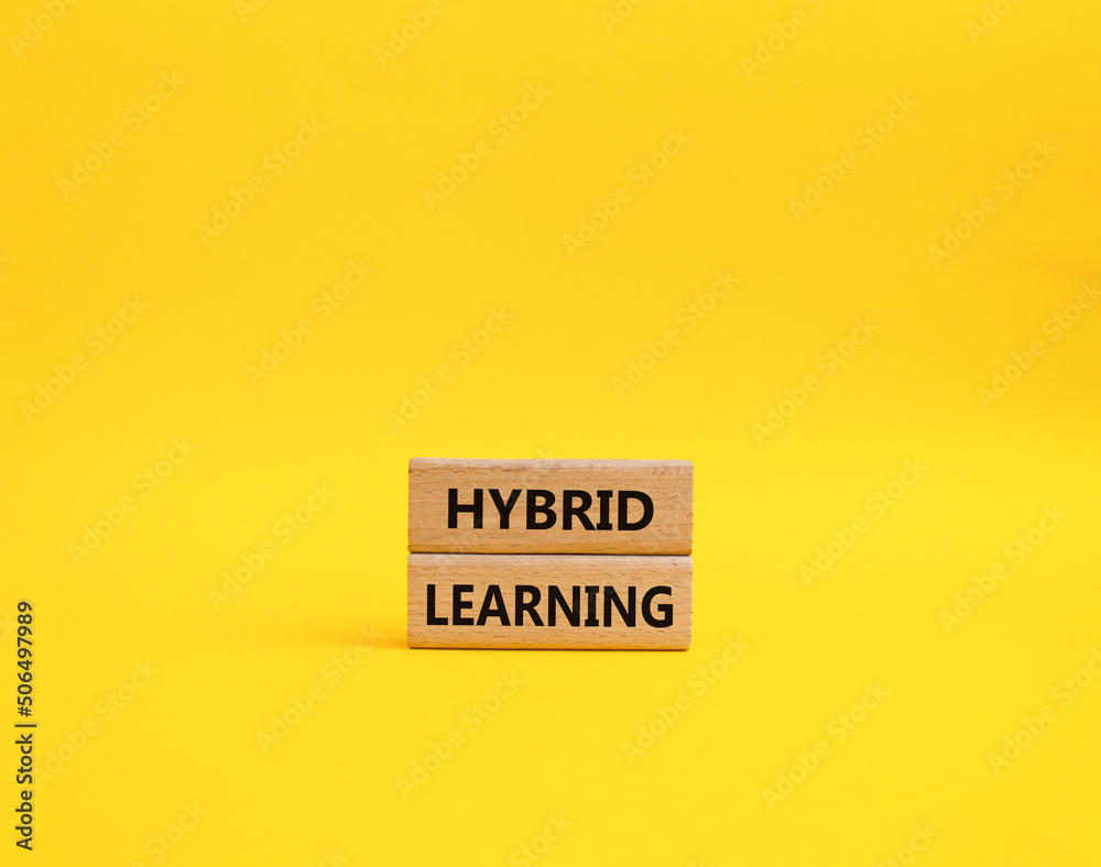 Hybrid learning symbol. Concept word Hybrid learning on wooden blocks ...