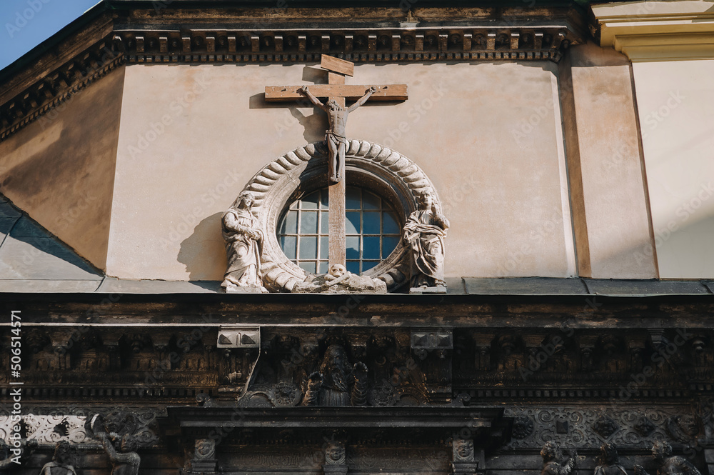 The upper part of the Boim Chapel with a round window and a sculpture ...
