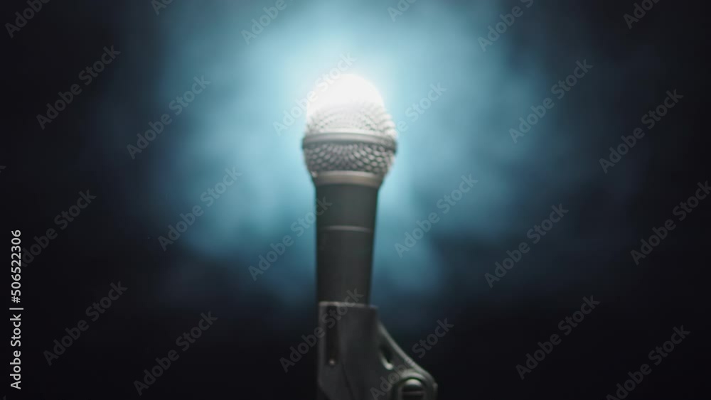 Microphone close-up, mic with smoke and black background. Karaoke ...