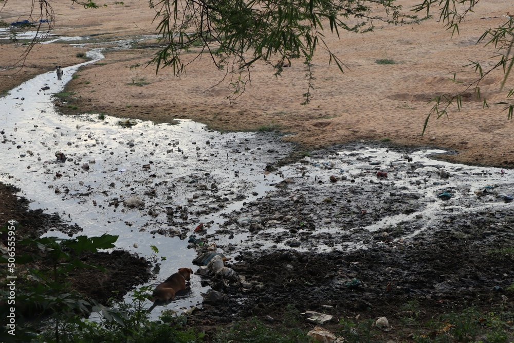 Scene of dirty sewer mixing when there is no water in the river. Stock ...